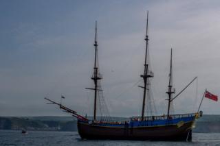Captain Cook's Endeavour replica comes 'home' to Whitby - BBC News