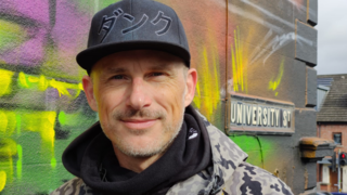 Belfast murals: Dan Kitchener returns for new artwork - BBC News