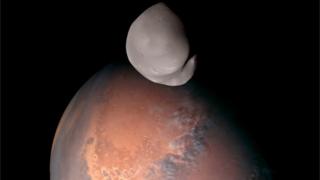 Deimos: UAE Spacecraft captures rare detailed photo of Mars' moon - BBC ...