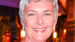 Period pain affects 'about half' of women workers - BBC News