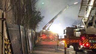 Willenhall fire: Food factory blaze response scaled back - BBC News