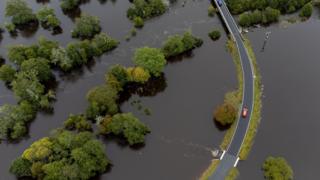 Landslide-hit A83 remains closed after flooding - BBC News