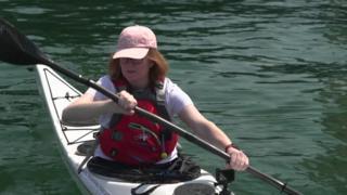 Woman sets out to finish brother's kayak challenge - BBC News