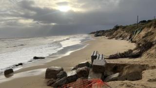 Hemsby residents in 'utter shock' after clifftop road collapses - BBC News