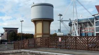 Cardiff water tower 50ft high mural unveiled - BBC News