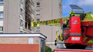 Erith: Two people rescued from London flat block fire - BBC News