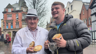Wigan pie-eating champion polishes off pie in 64 seconds - BBC News