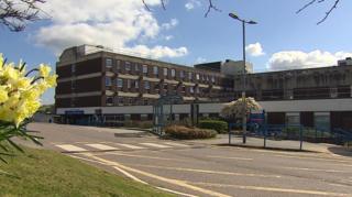 Demolition of North Devon hospital accomodation blocks under way - BBC News