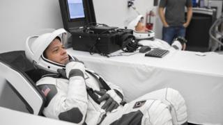 Spacesuit for return to the Moon unveiled - BBC News