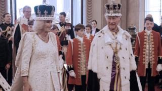 King Charles jokes about 'sausage fingers' with Prince William in Coronation film - BBC News