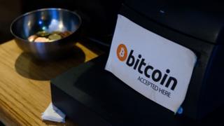Bitcoin digital currency hits three-year high of $1,000 - BBC News