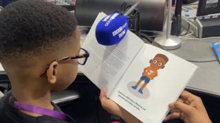 Five-year-old Birmingham author hosts story session at library - BBC News