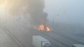 M11: Lorry fire shuts northbound carriageway in Cambridgeshire - BBC News