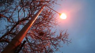 Why are street lights being turned off by English councils? - BBC News