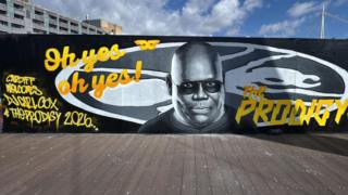 Carl Cox 'humbled' by Cardiff mural celebrating The Prodigy tour - BBC News