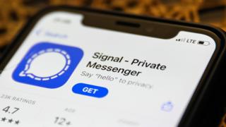 Apple joins opposition to encrypted message app scanning - BBC News