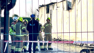 Crews work to contain fire in Burnham-on-Crouch farm buildings - BBC News