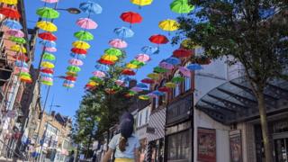 Umbrella art installation in Watford champions neurodiversity - BBC News