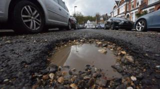 Blind opera singer's concern over Staffordshire pothole danger - BBC News