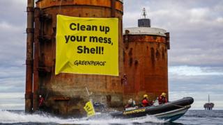 Oil giant Shell suing Greenpeace for £1.7m damages - BBC News