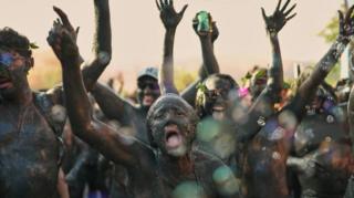 People in Brazil celebrate Carnival with mud parties - BBC Newsround