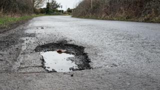Potholes map rates council road repair progress - BBC News