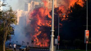 Israel fires: Tens of thousands flee as fires hit Haifa - BBC News
