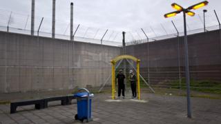In pictures: The Dutch prison asylum seekers call home - BBC News