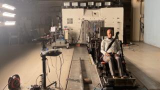 The crash dummy aimed at protecting women drivers - BBC News