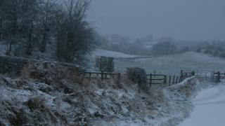 Snow sweeps through Scotland after big freeze - BBC News