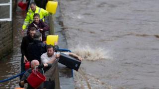 More rain forecast as Storm Bert clean-up begins - BBC News