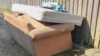 Bootle: 'Fly-tipping filth is a disgrace on our streets' - BBC News