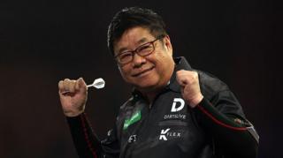 World Darts Championship: Paul Lim, 71, becomes oldest player to win ...