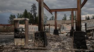 Jasper fire: Images show destruction from wildfire in Canada - BBC News