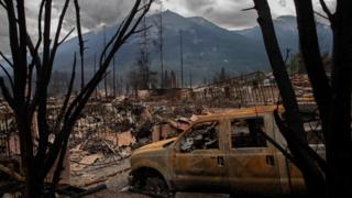 Jasper fire: Images show destruction from wildfire in Canada - BBC News