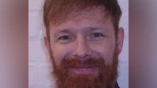 Man arrested after prisoner absconds from HMP Spring Hill - BBC News