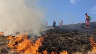 Peak District wildfire extinguished, crews say - BBC News