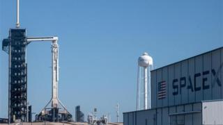 SpaceX launch to help stranded astronauts home postponed - BBC News