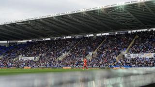 Reading fan 'can't stop smiling' after Rob Couhig deal struck - BBC News