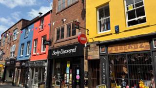 Derby's Sadler Gate gets colourful new look - BBC News