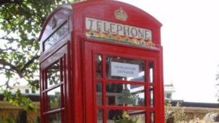 Phone boxes turn green to charge mobiles - BBC News