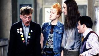 Rik Mayall 'suffered cardiac event', says wife - BBC News