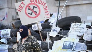 Ukraine: Putin aide brands Poroshenko 'Nazi' ahead of EU deal - BBC News