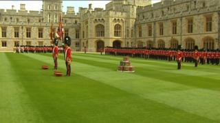 Queen presents new colours to Welsh Guards in ceremony - BBC News