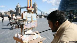 Painter Keith Jansz marks 20 years of paralysis with exhibition - BBC News