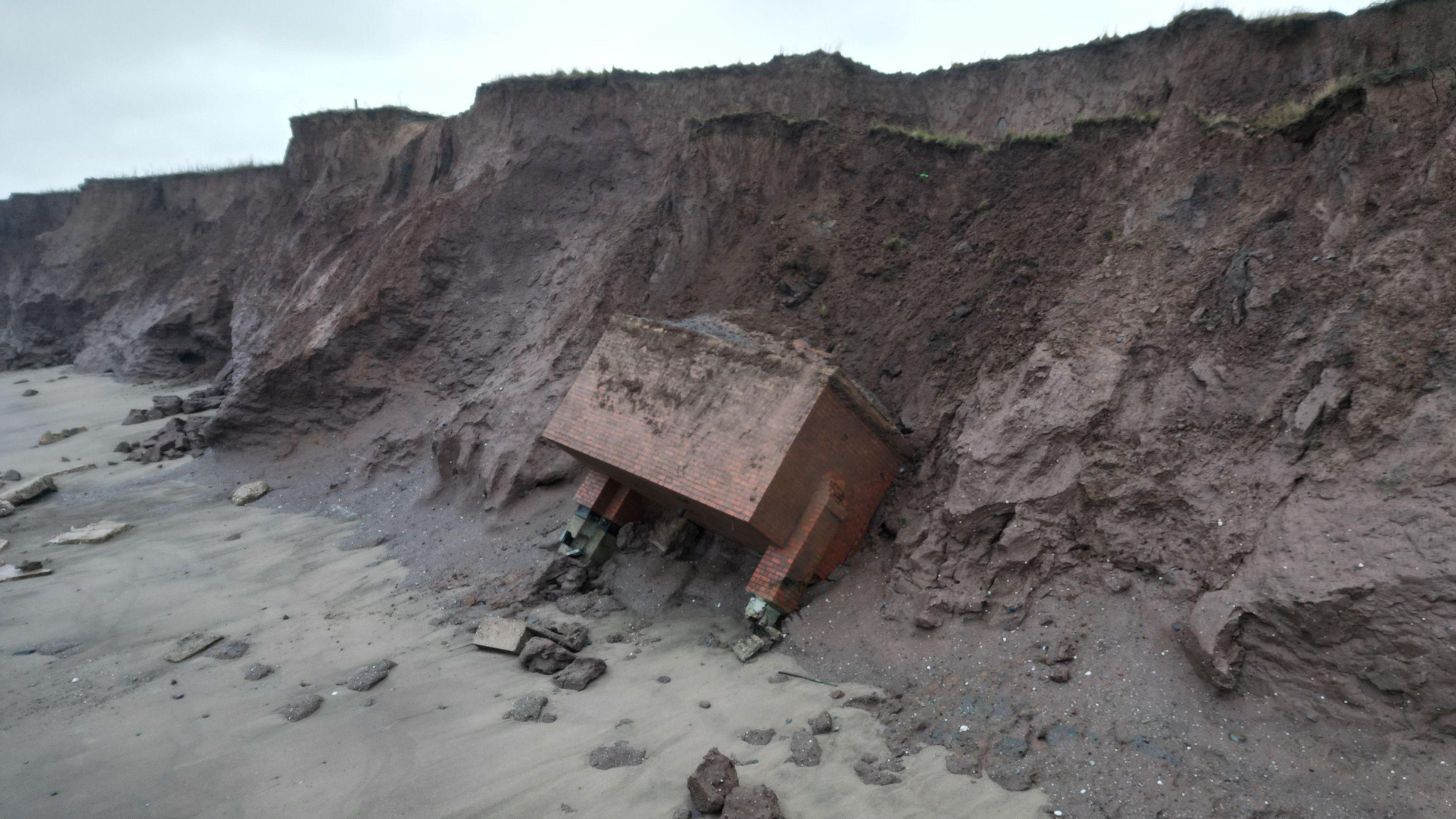 Nuclear bunker in East Yorkshire topples from crumbling cliff - BBC News
