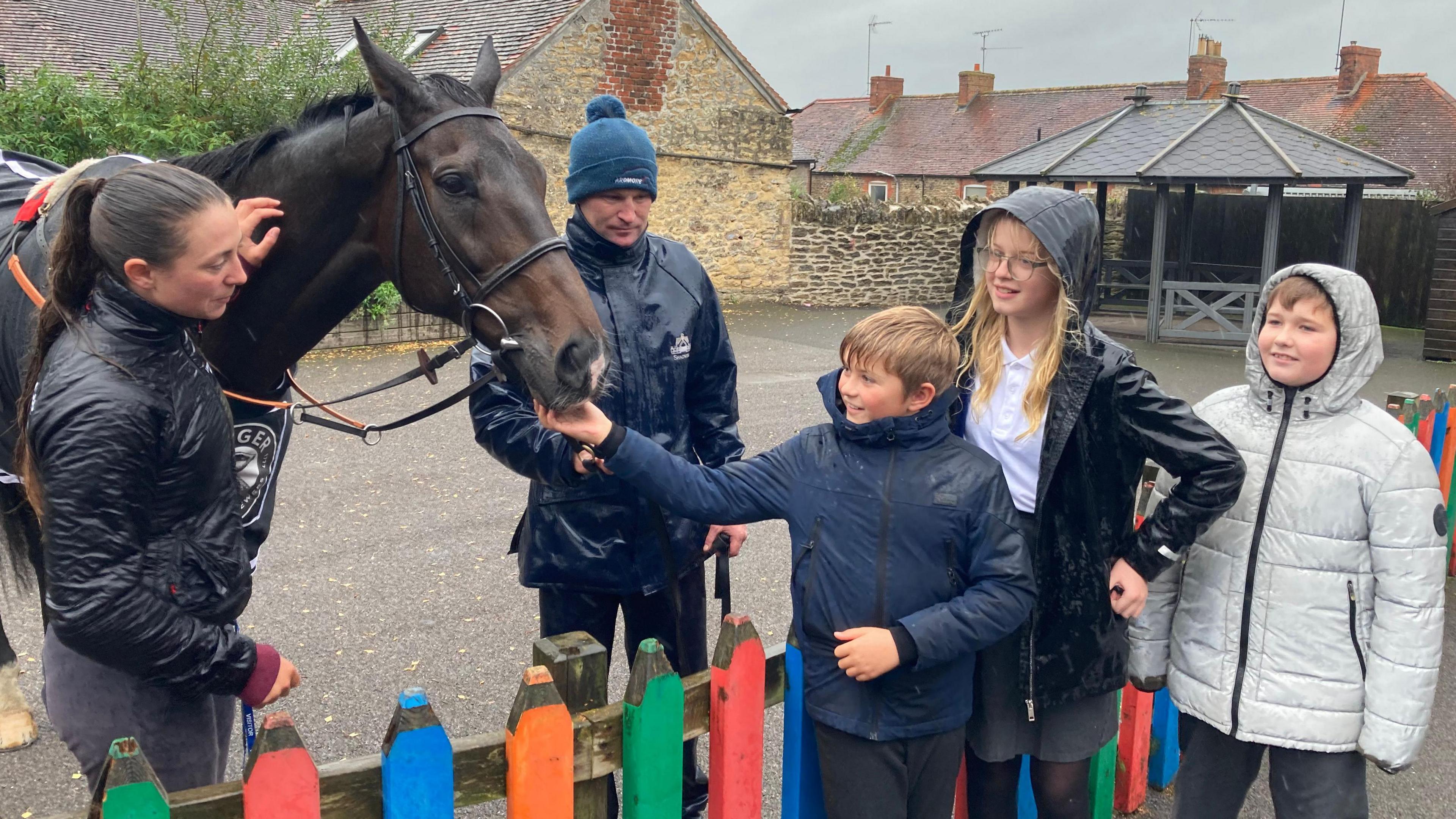 Jockey Bryony Frost and horse Frodon head to Wincanton school - BBC News