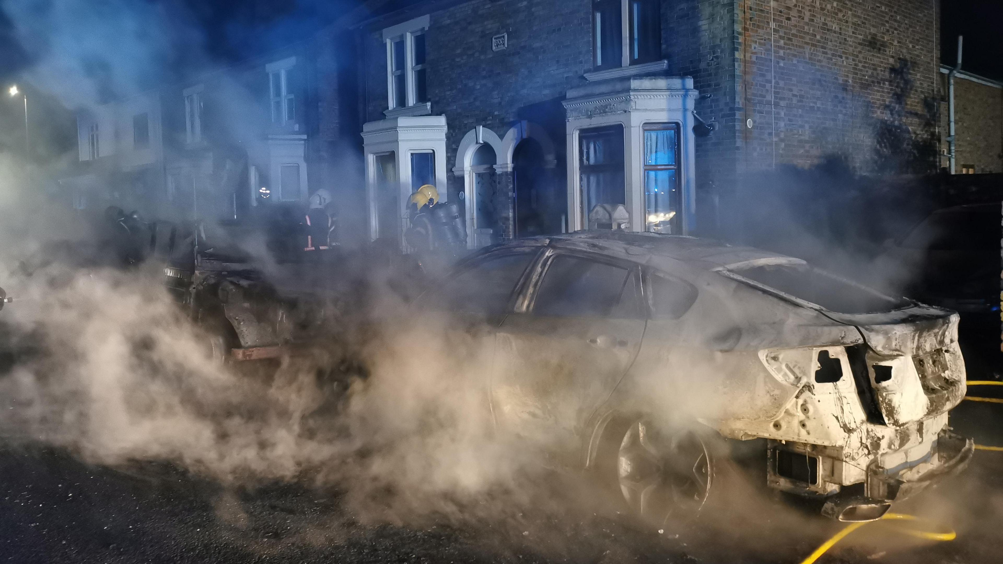 Several cars on Peterborough street destroyed by fire - BBC News