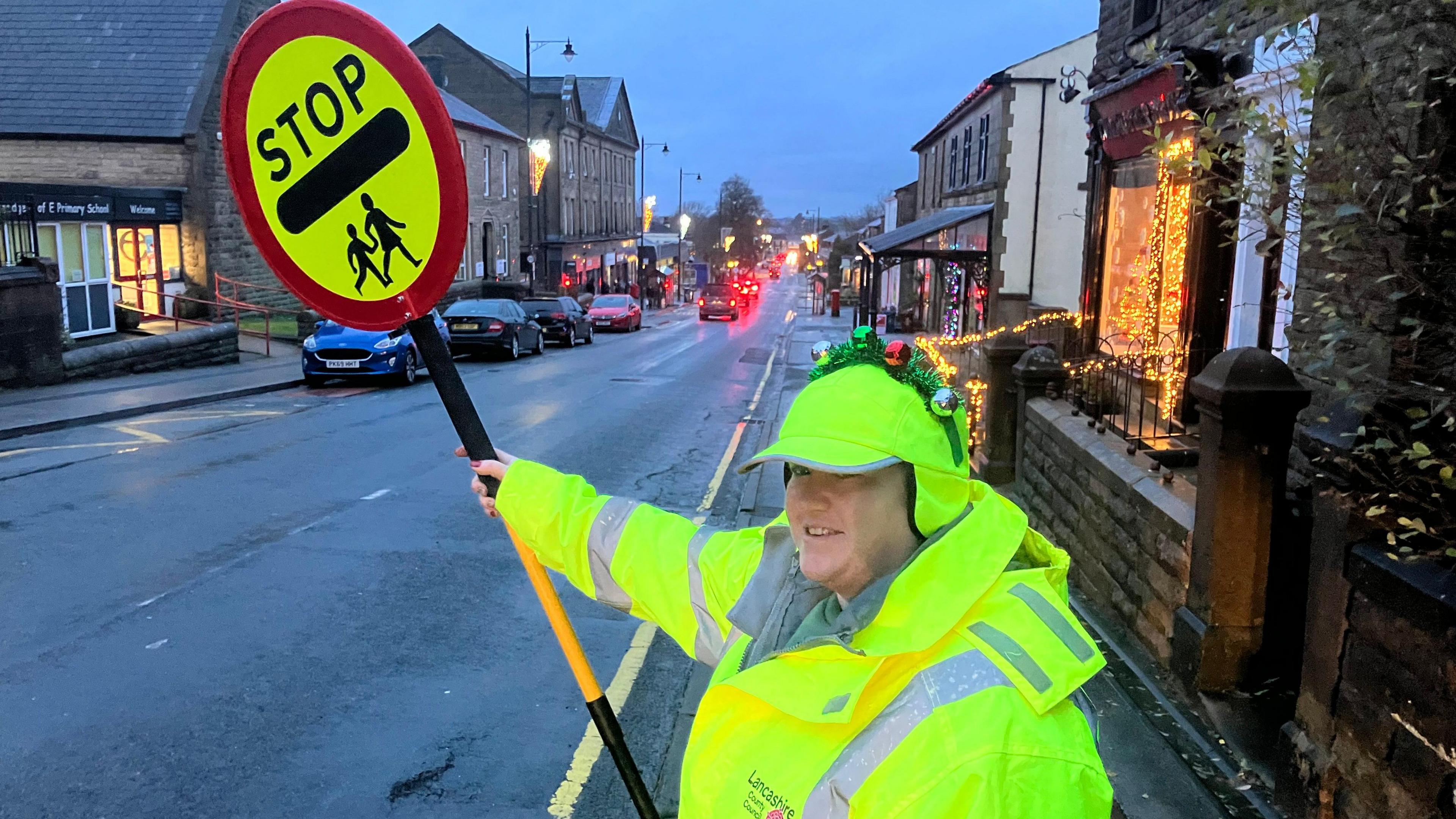 Lancashire lollipop lady takes over in Longridge after 56 years - BBC News