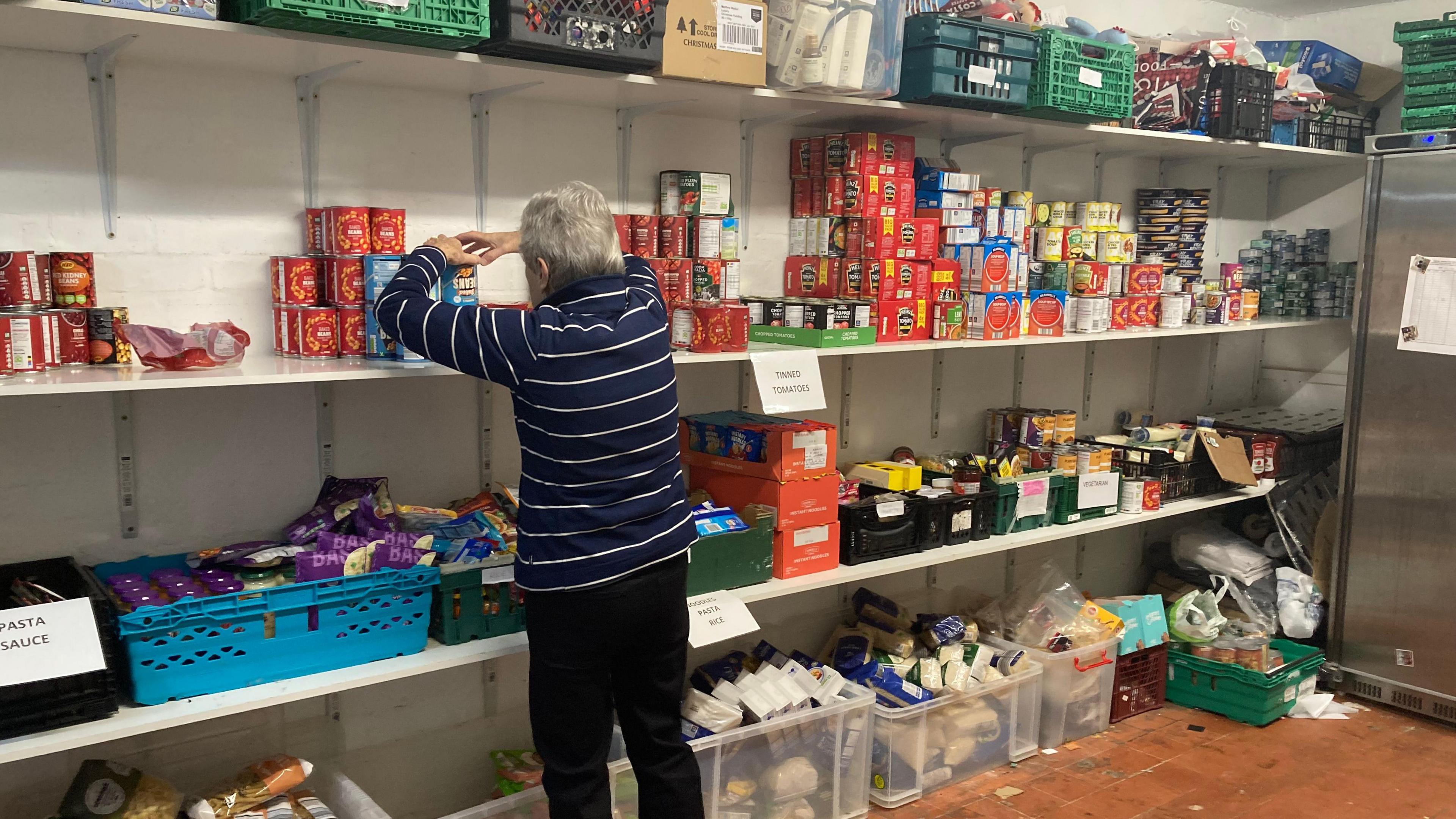 Empty shelves fill Coventry food hub volunteers with dread - BBC News